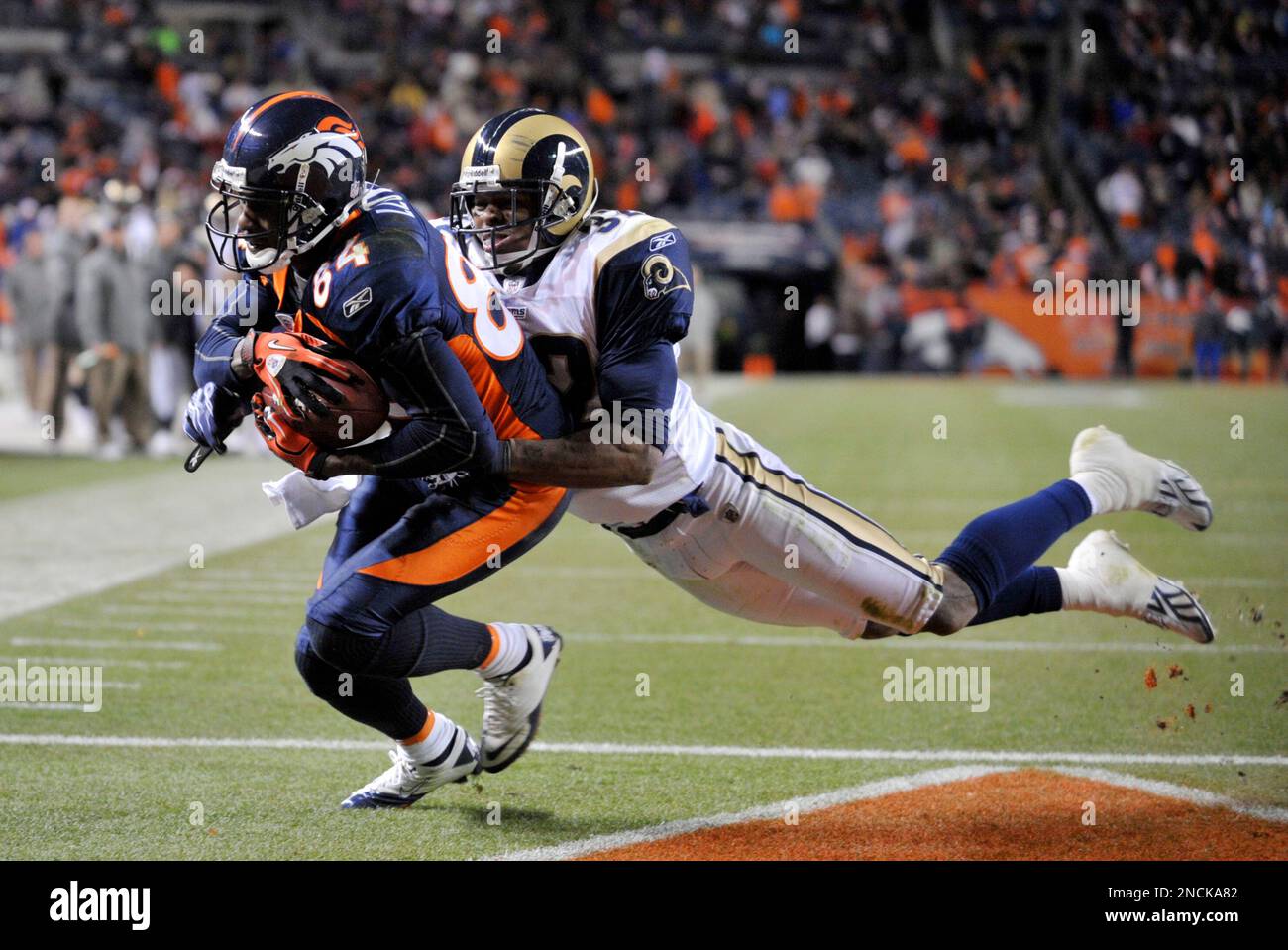 Denver Broncos wide receiver Brandon Lloyd (84) catches a touchdown ...