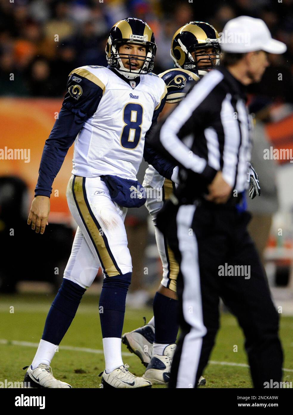 St. Louis Rams quarterback Sam Bradford looks at a referee during the ...