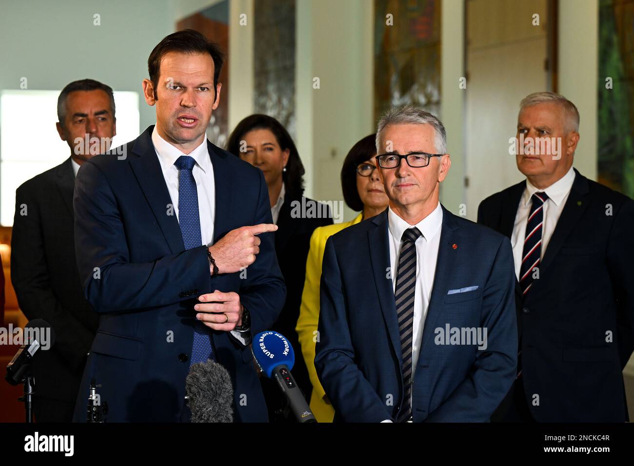 Nationals Senators Matt Canavan (left) and Gerard Rennick speak to the ...