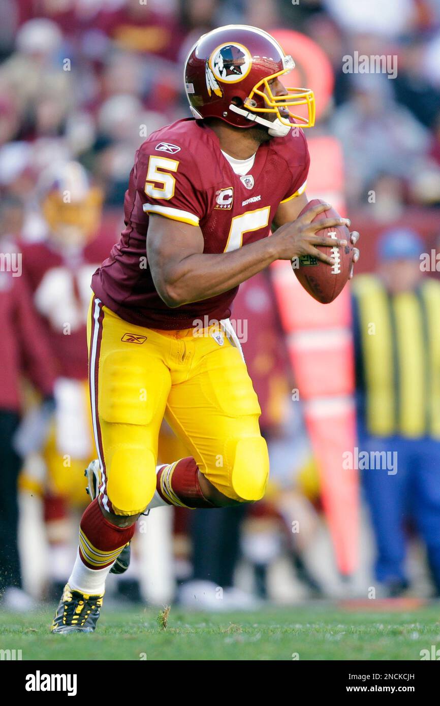 Washington Redskins quarterback Donovan McNabb scrambles during the ...