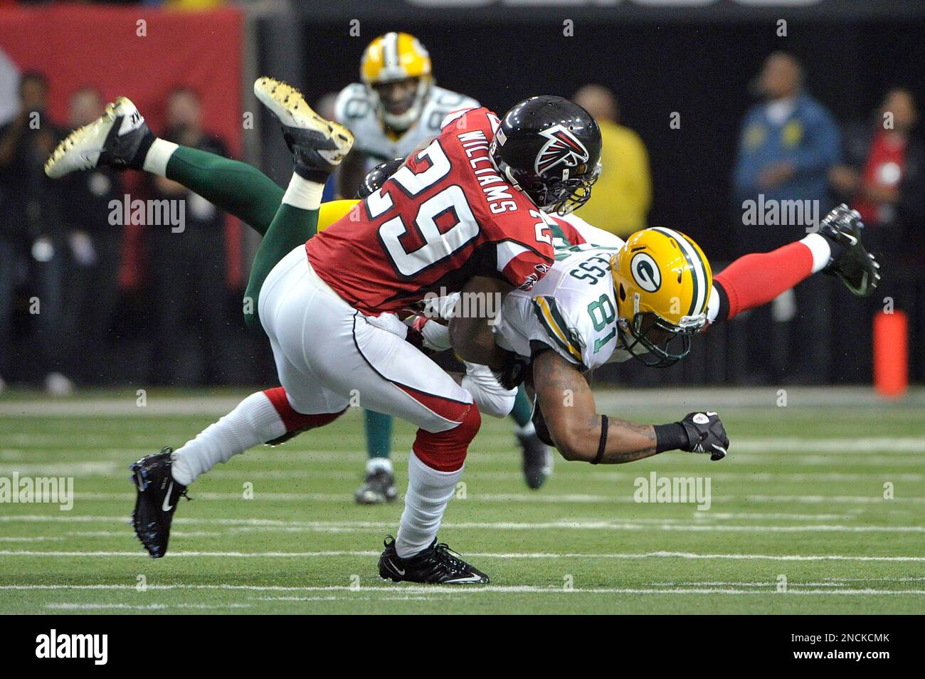 Atlanta Falcons defender Brian Williams (29) takes down Green Bay ...