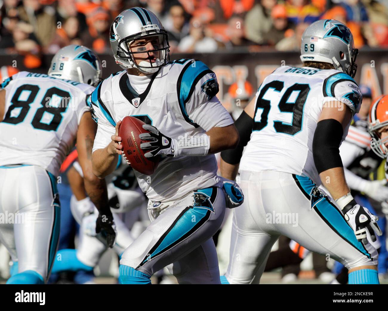 Carolina Panthers quarterback Jimmy Clausen (2) drops back to pass ...