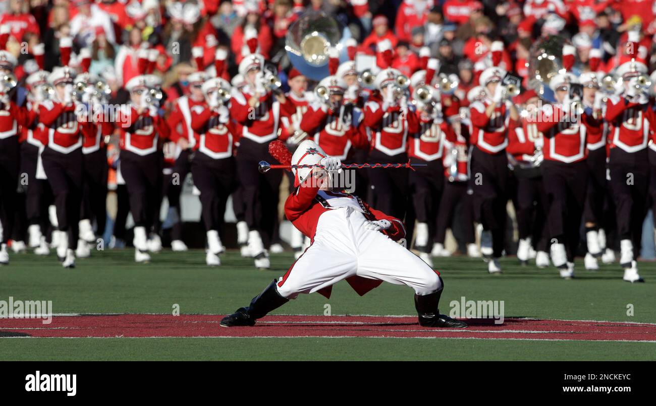 The Wisconsin band performs before the first half of an NCAA college ...