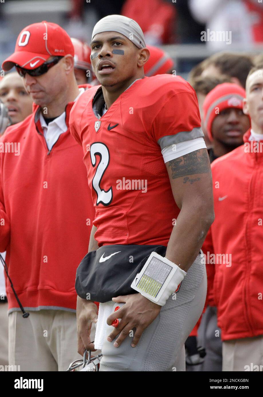 Ohio State quarterback Terrelle Pryor (2) watches from the sidelines ...