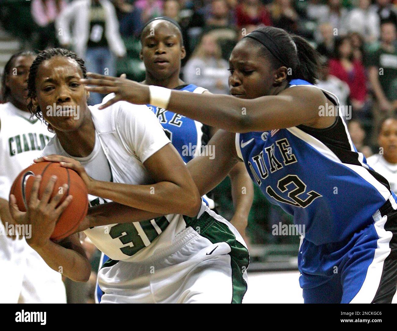 Charlotte's Jennifer Hailey (30) and Duke's Chelsea Gray (12) battle ...