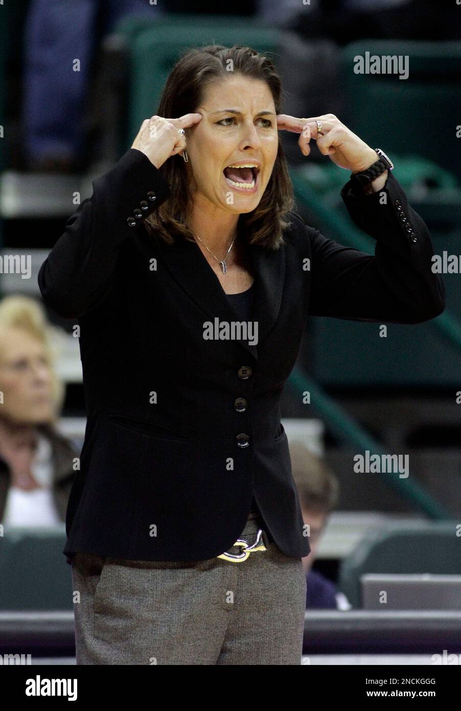 Duke coach Joanne McCallie urges her team on during the first half of ...
