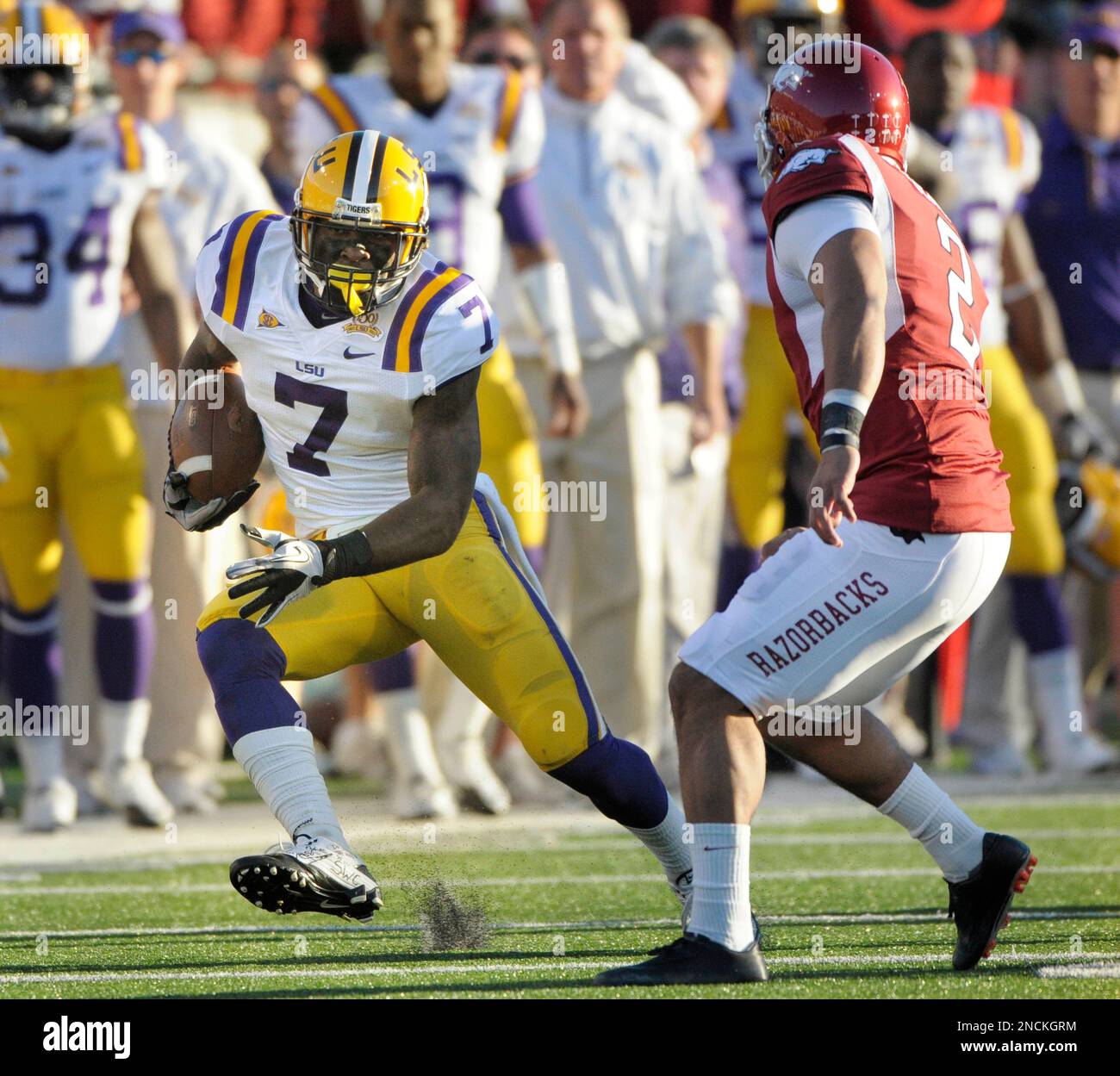 LSU cornerback Patrick Peterson (7) eludes Arkansas kicker Alex Tejada ...