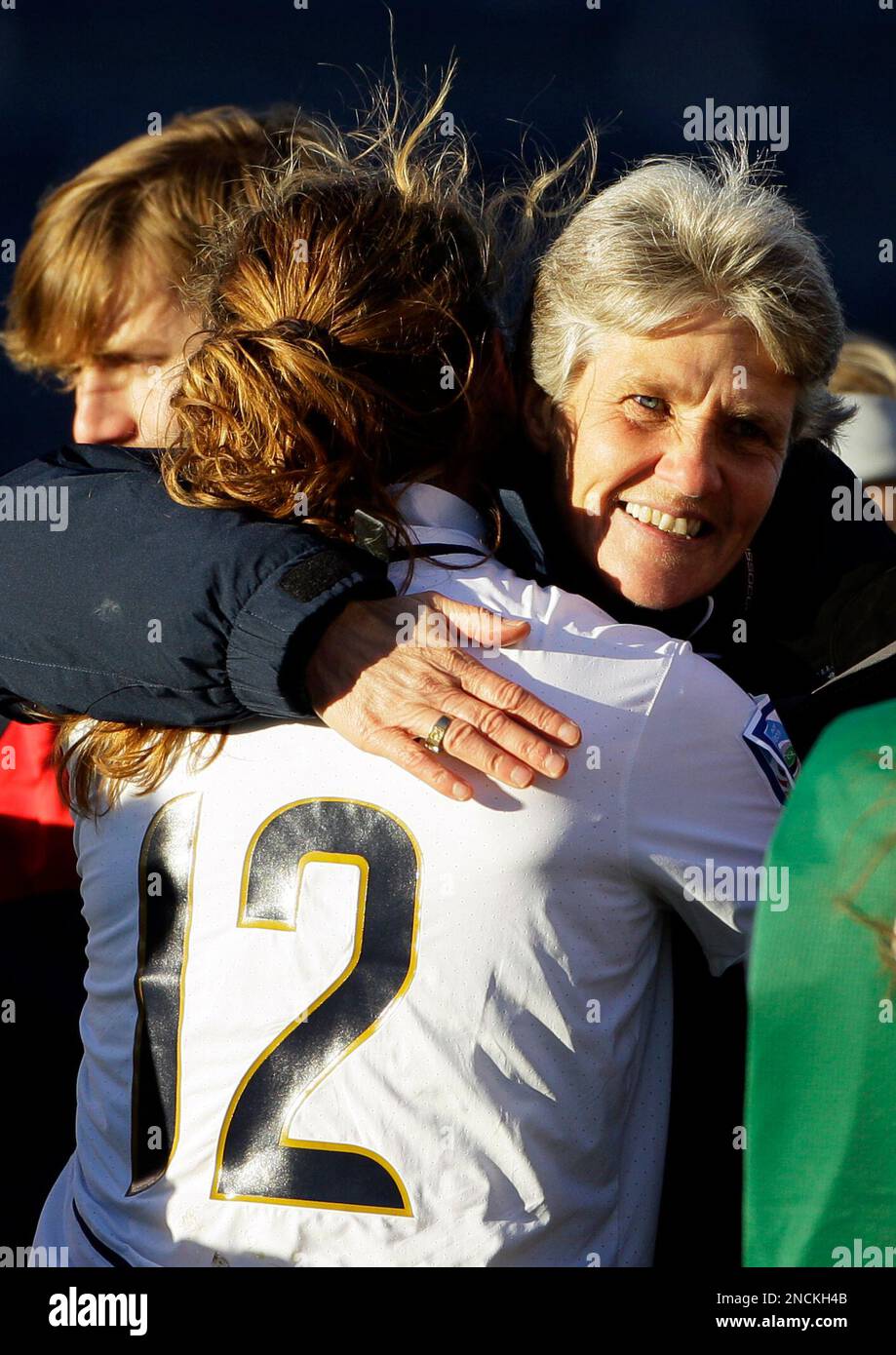 United States head coach Pia Sundhage, right, celebrates with Lauren ...