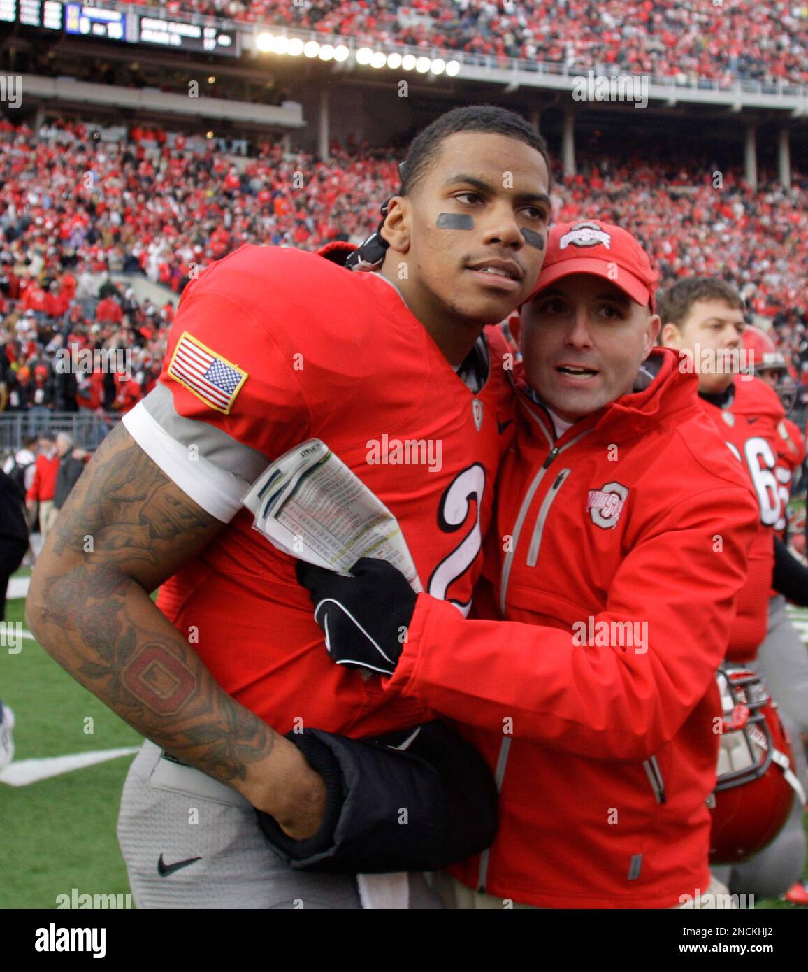 Ohio State's Terrelle Pryor, left, celebrates with quarterbacks coach ...
