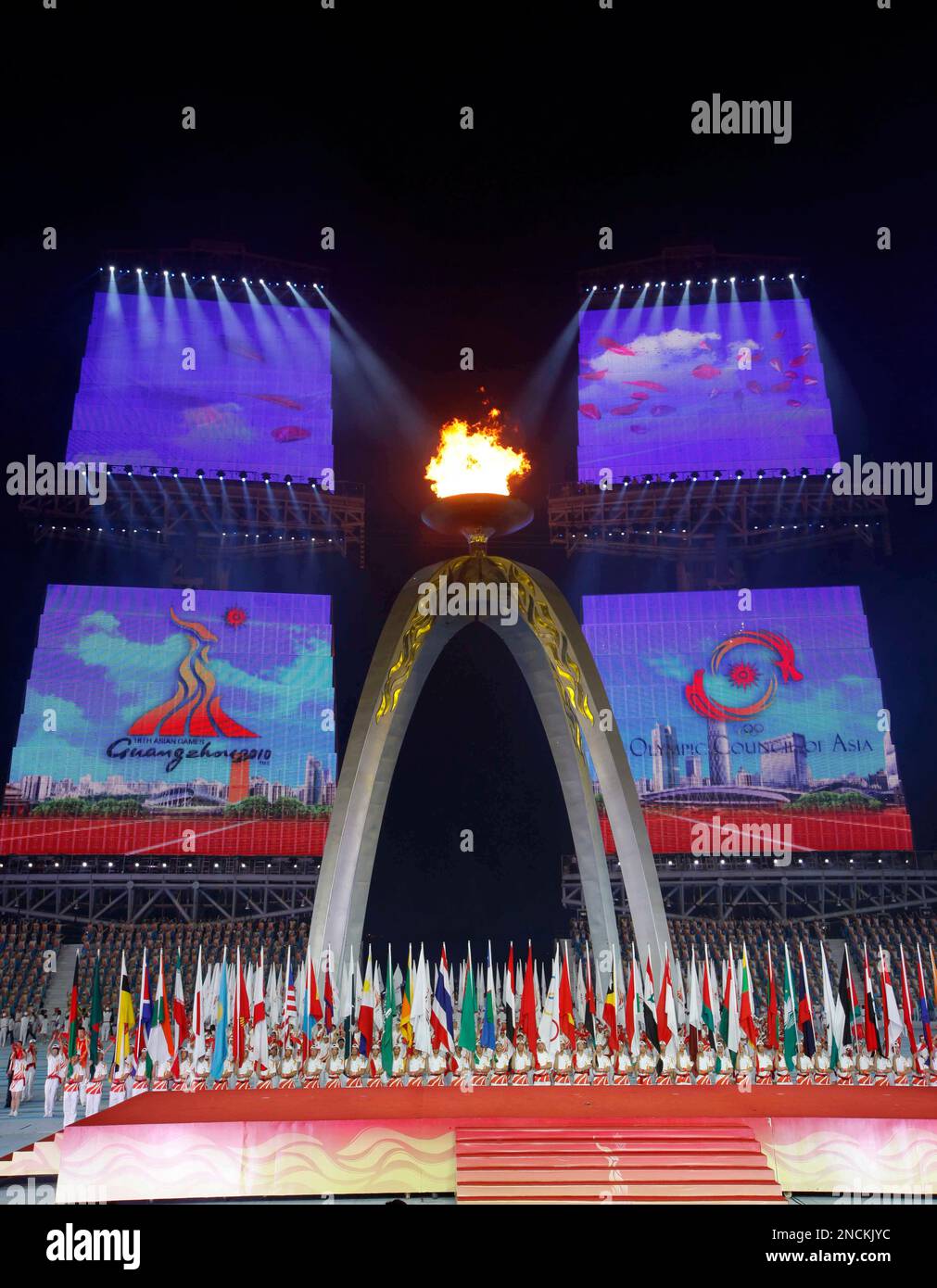 Flags of the countries which took part in the Asian Games line up ...