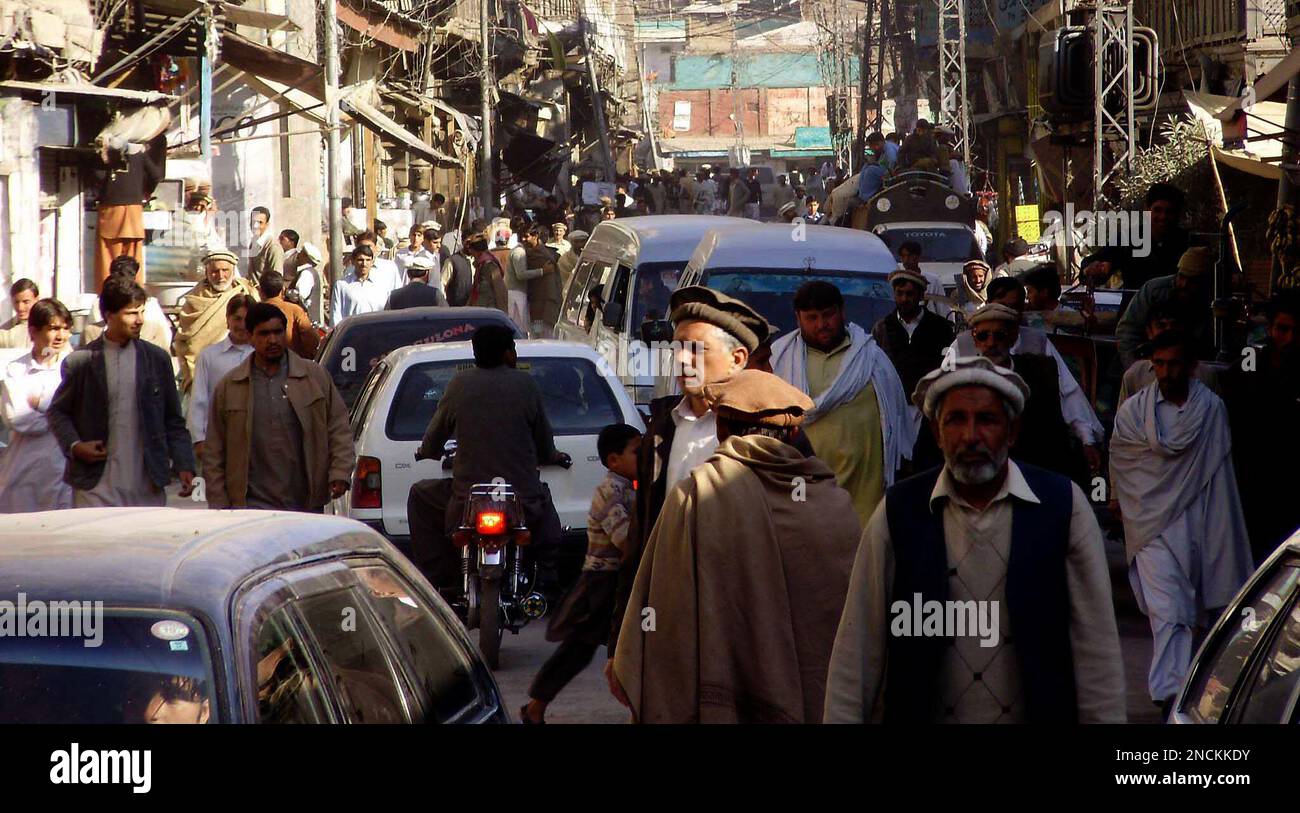 In this picture taken on Nov. 24, 2010 People are seen in a main market ...