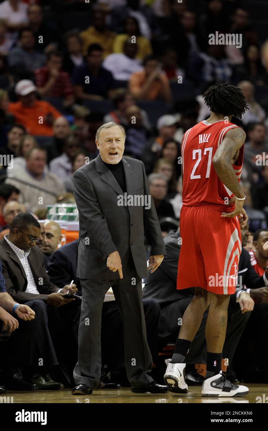 Houston Rockets head coach Rick Adelman, left, directs his team against ...