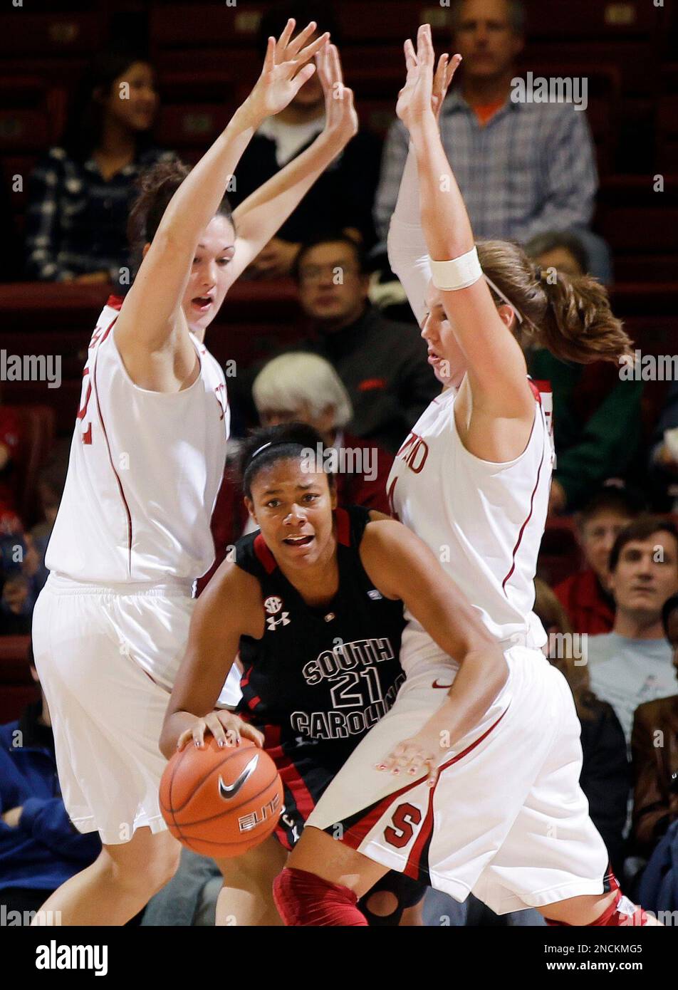 South Carolina forward Ashley Bruner, center, is defended by Stanford ...