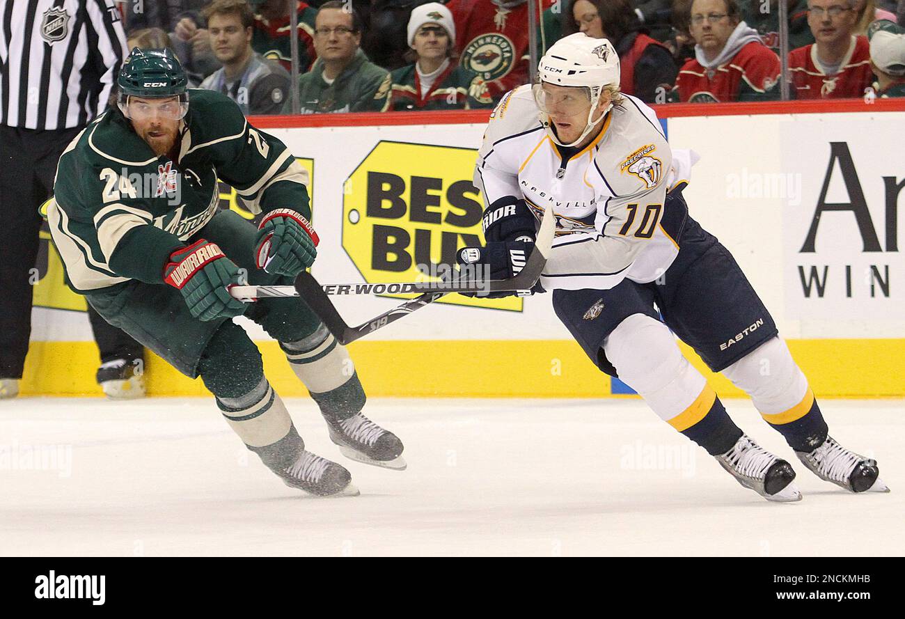Nashville Predators right wing Martin Erat, right, battles with Martin ...