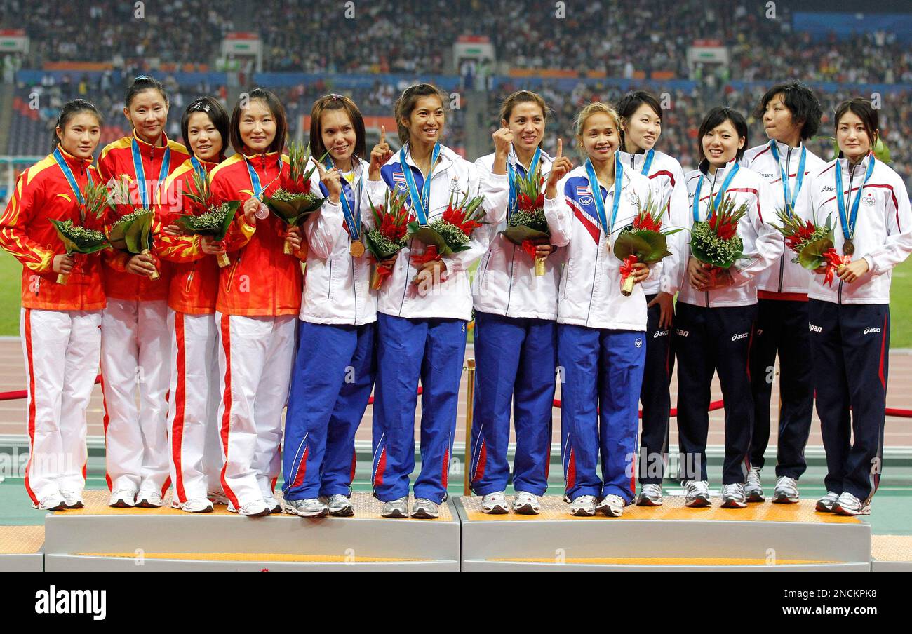 From left, silver medal's winner China, gold medal's winner Thailand ...