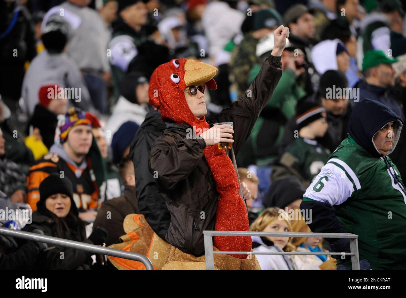 Fans wear turkey suits during the second quarter of an NFL football ...
