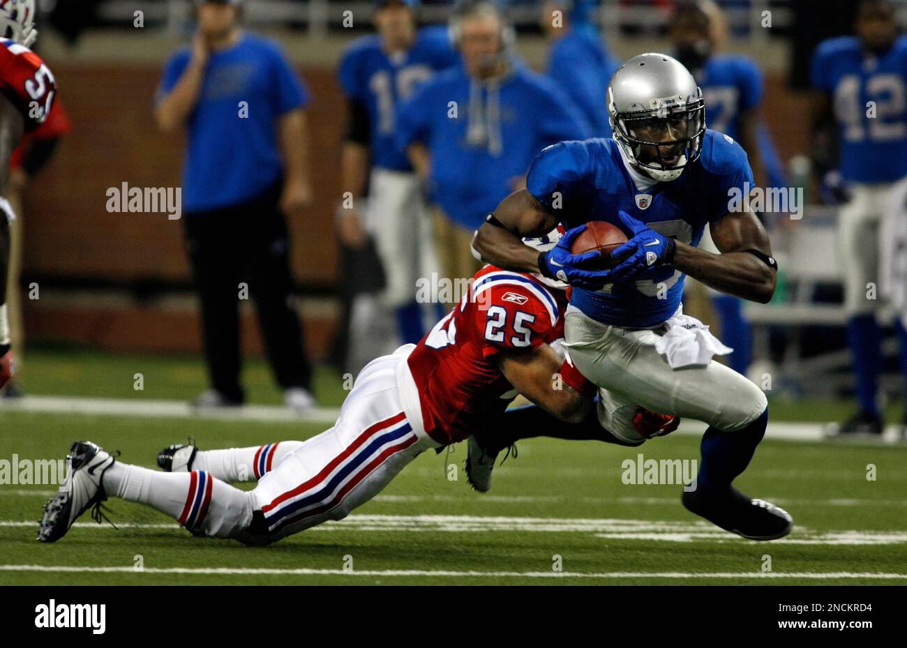 New England Patriots safety Pat Chung (25) tackles Detroit Lions wide ...