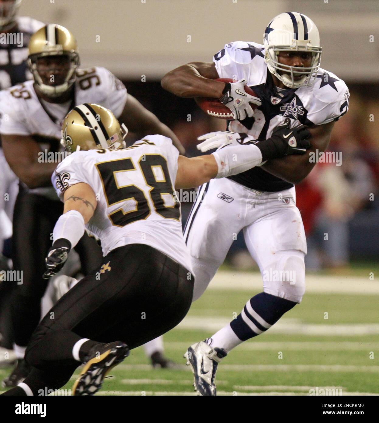 Dallas Cowboys running back Felix Jones (28) runs the ball against New ...