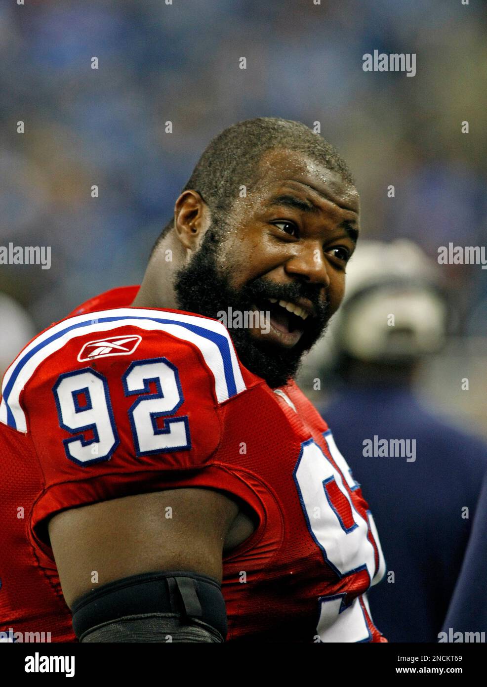 New England Patriots defensive tackle Gerard Warren (92) laughs on the ...