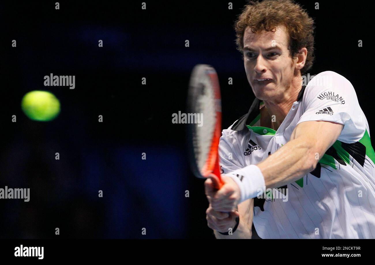 Britain's Andy Murray plays a return to David Ferrer of Spain during a ...
