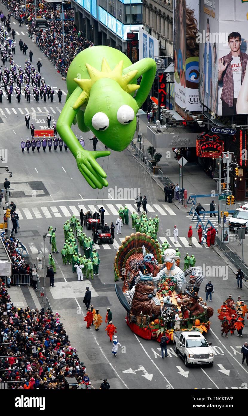The Kermit the Frog balloon floats through Times Square during the Macy ...