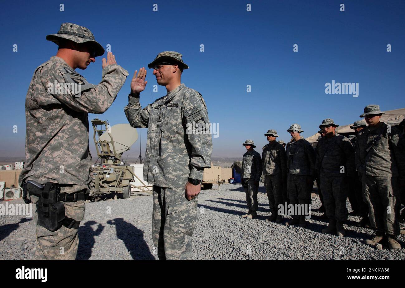 US Army Lt. Col. Johnny K. Davis, foreground center, congratulates 1st ...