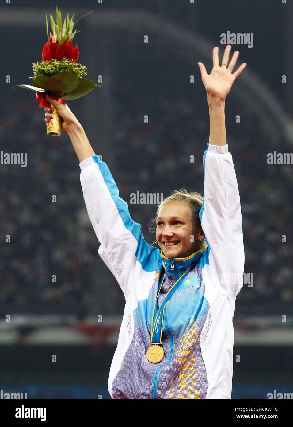 Kazakhstan's Olga Ripakova poses with the gold medal she won in the ...