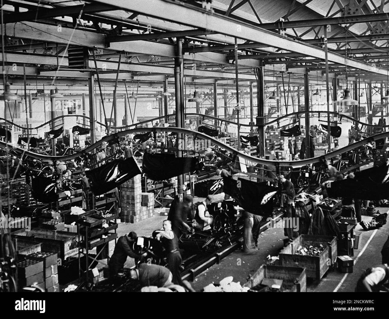 One of the many assembly lines at the Morris Car Works, in Cowley ...