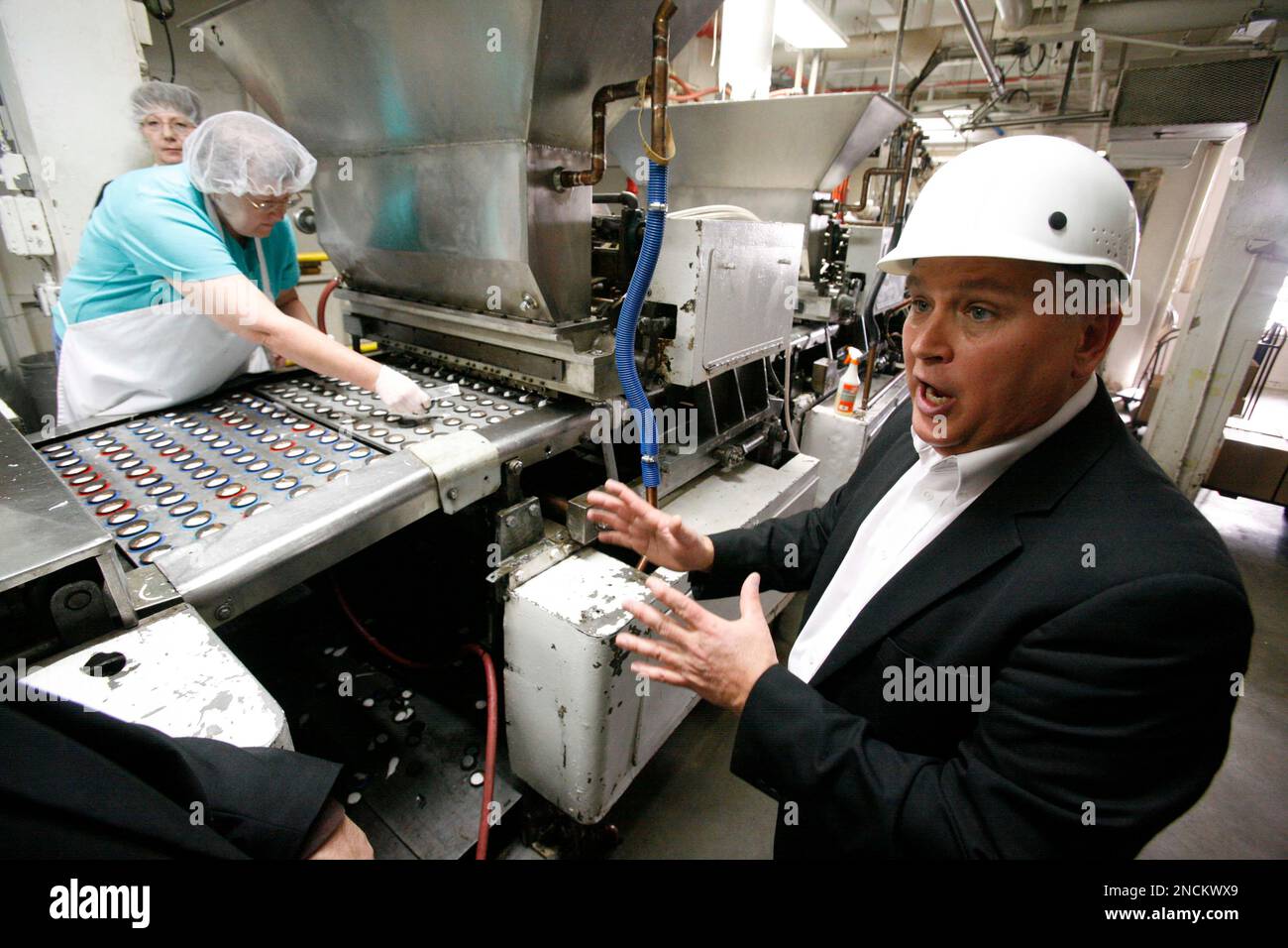In this Nov. 11, 2010 photo, Boyer Candy Company CEO Bob Faith, right ...
