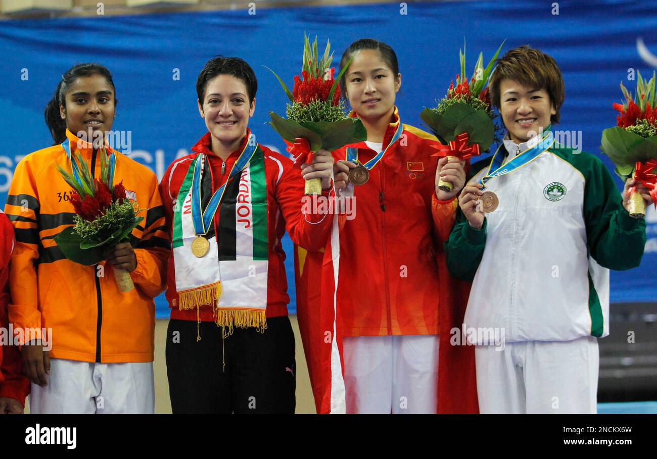 Medalists from left, silver medalist Jamaliah Jamaludin of Malaysia ...