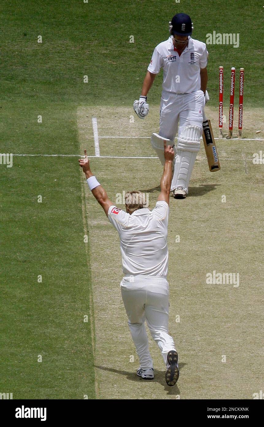 Australia's Shane Watson, left, celebrates bowling out England's ...