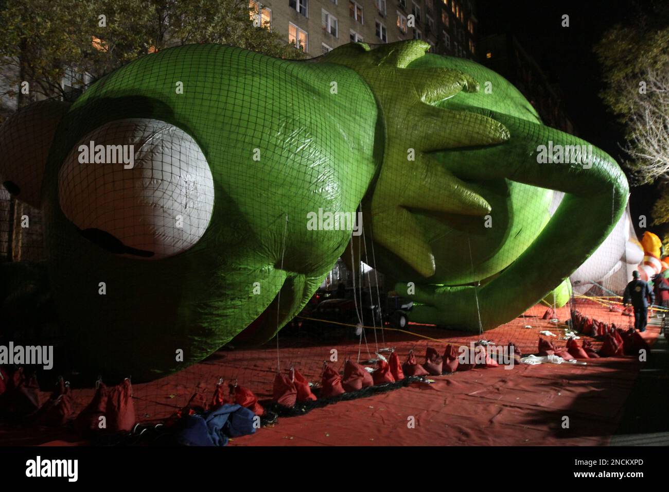 The Kermit the Frog balloon lies with other balloons on view for the ...