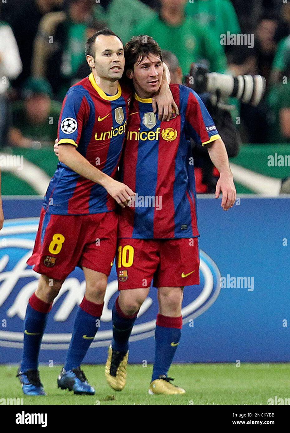 Barcelona's Lionel Messi, right, and Andres Iniesta reacts after the ...