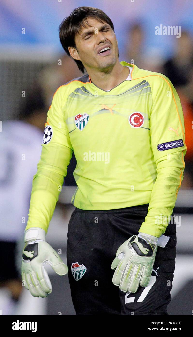Bursaspor's Dimitar Ivankov from Bulgaria reacts after letting in the ...