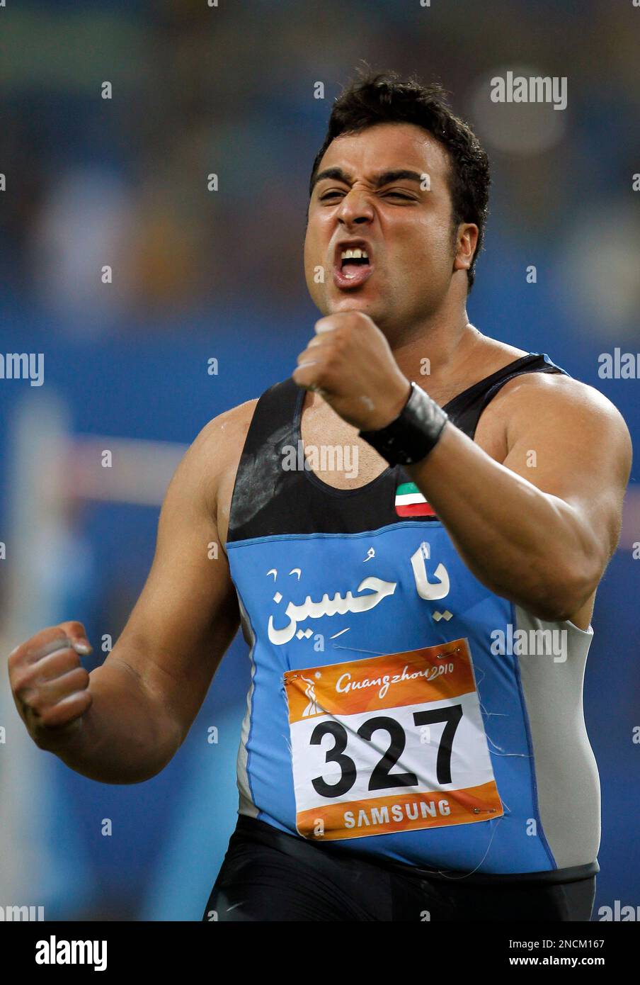 Iran's Ehsan Hadadi celebrates after winning the gold medal in the men ...