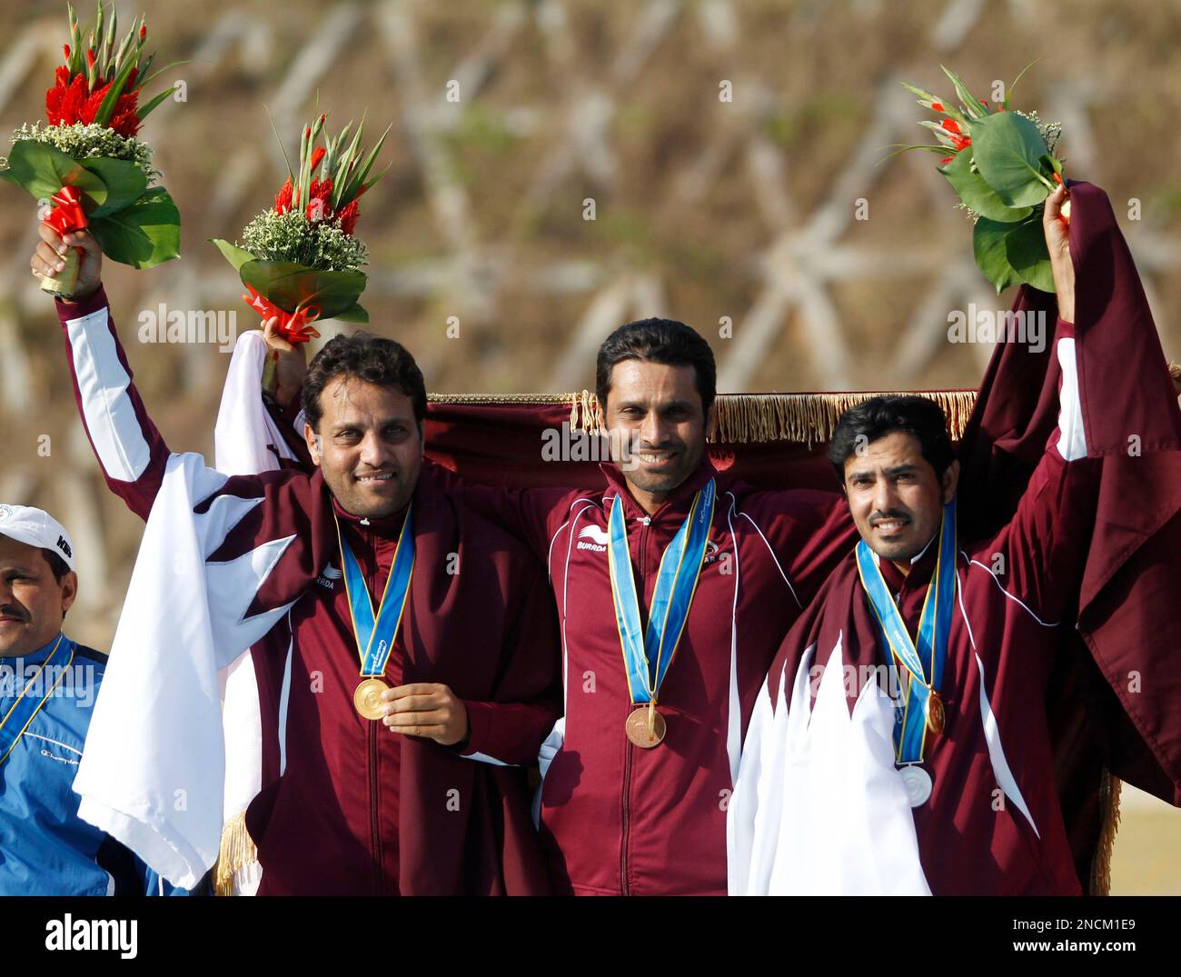 Qatar's team, from left to right, Aziz Saleh Alatiaya, Nasser Saleh ...