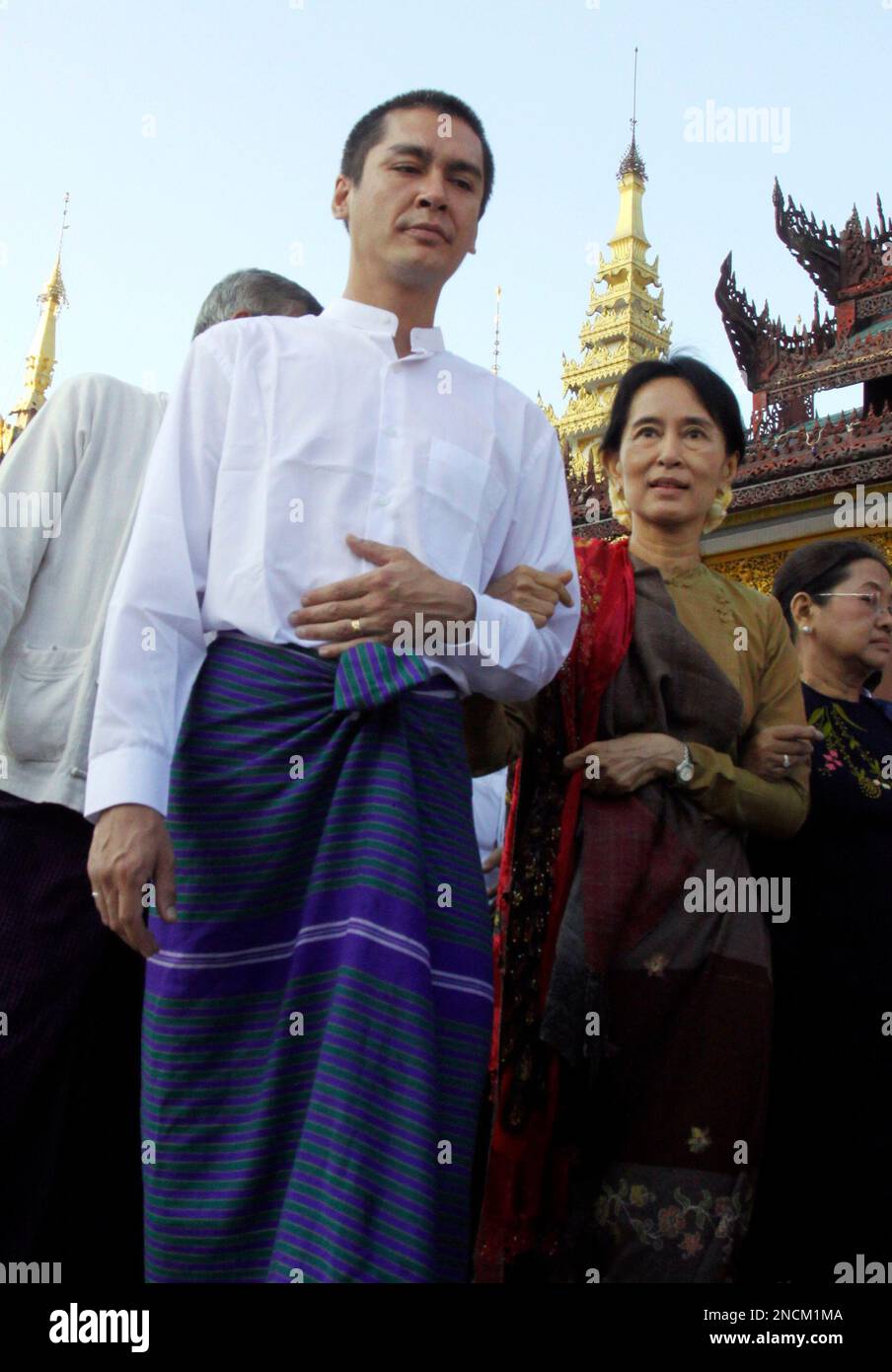 Myanmar's pro-democracy icon Aung San Suu Kyi walks with her son Kim Aris as they visit Myanmar ...