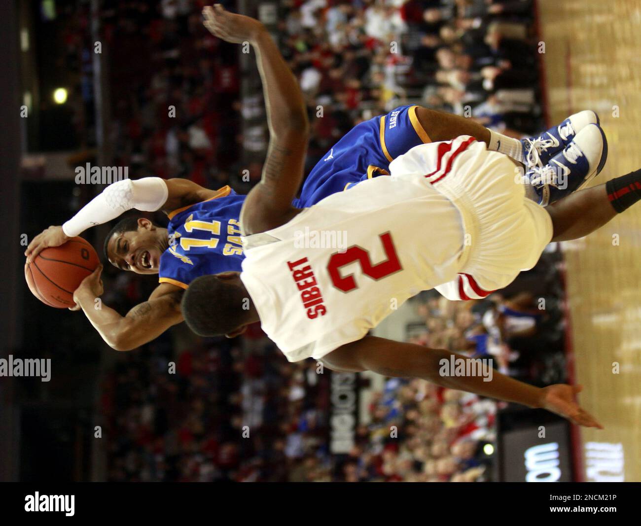Morehead State's Terrance Hill (11) charges into Ohio State's Jordon ...