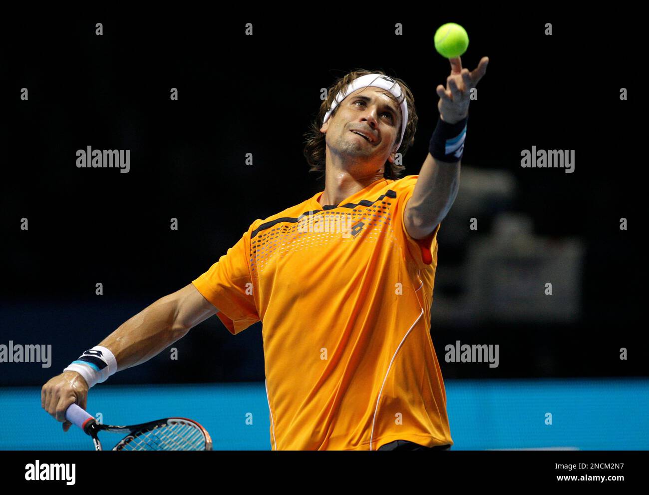 Spain's David Ferrer serves to Sweden's Robin Soderling during a round ...