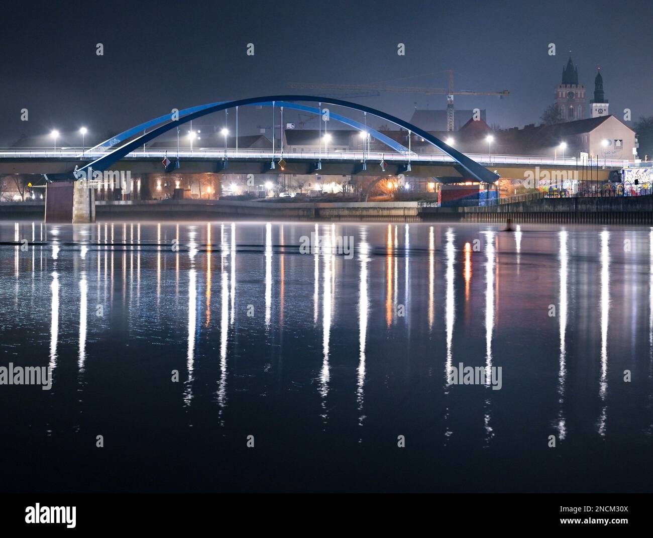 Slubice, Poland. 15th Feb, 2023. Brightly lit in the early morning is ...