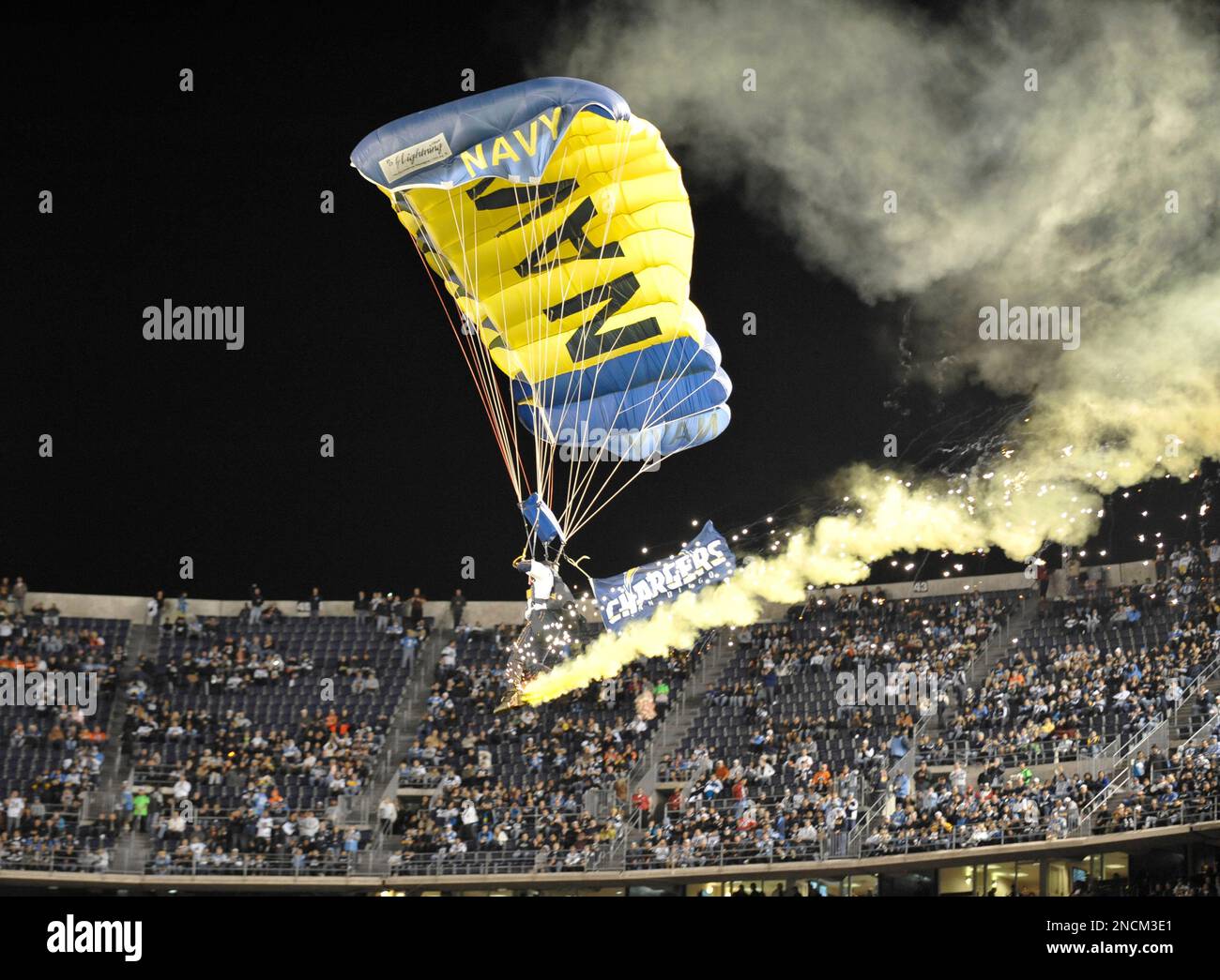 U.S. Navy Seals parachute into Qualcomm Stadium before an NFL football ...