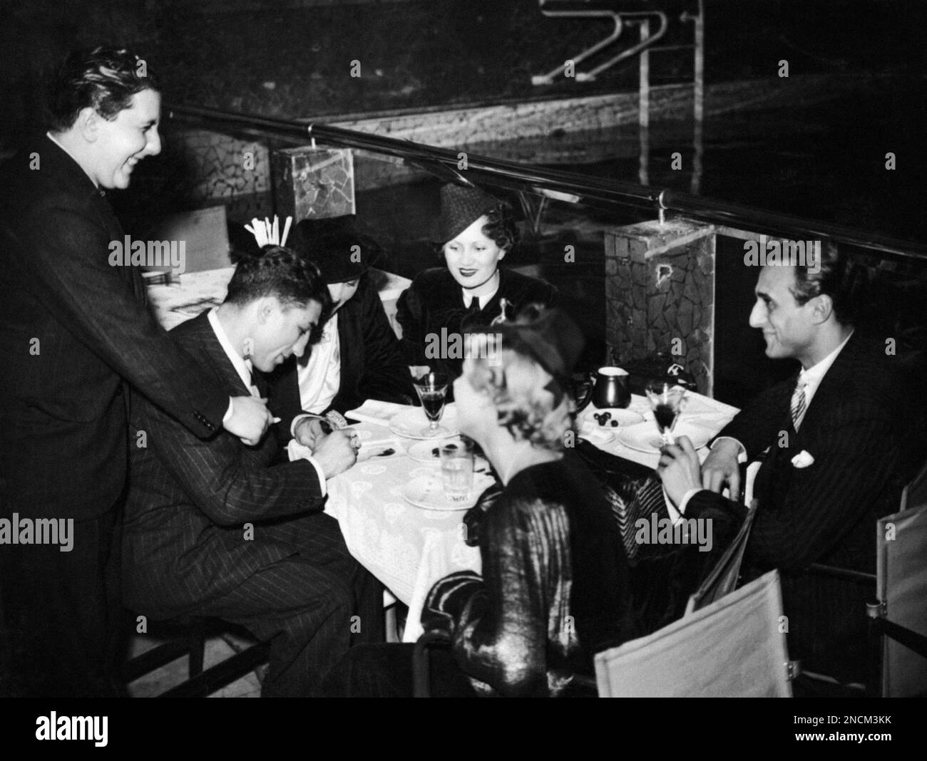 Famous Italian boxer Cleto Locatelli, second from left, signs ...