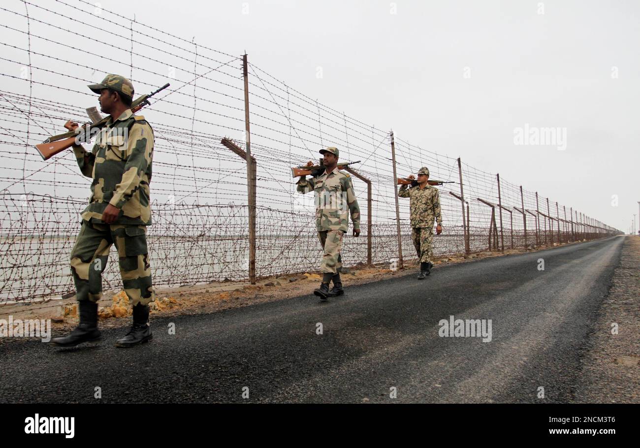 Border Security Force soldiers patrol at the India-Pakistan border ...