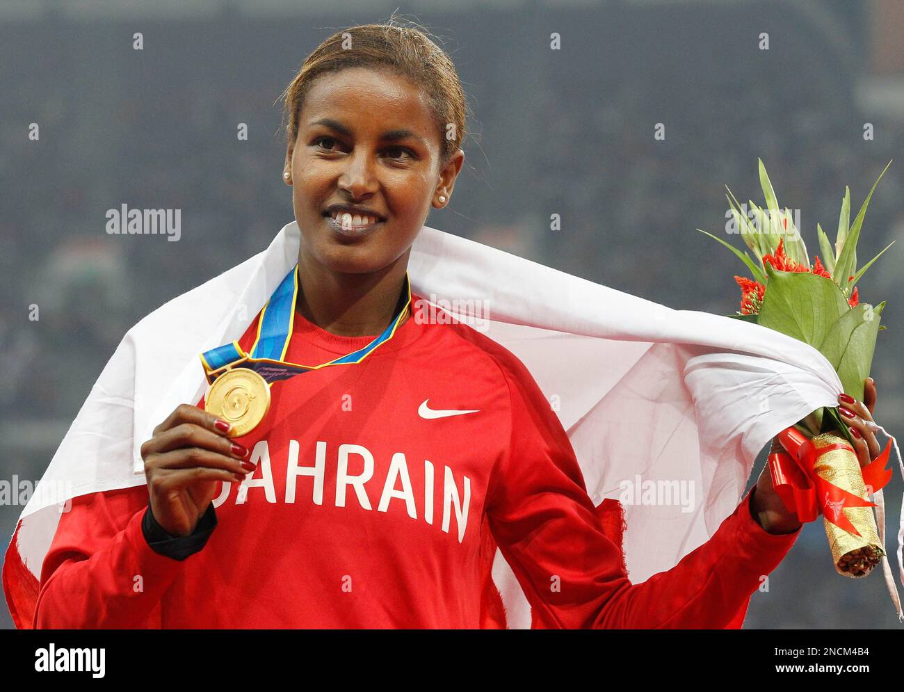 Bahrain's Maryam Yusuf Isa Jamal poses with the gold medal she won in ...