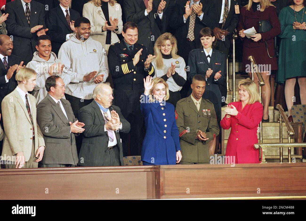 First lady Hillary Rodham Clinton, center, acknowledges the House ...