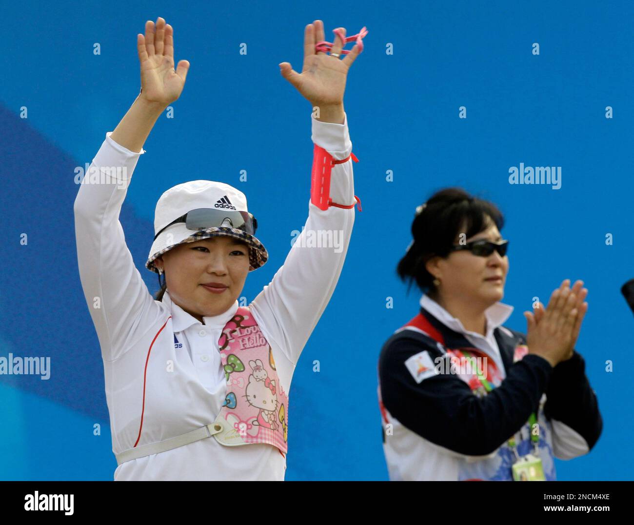 South Korean's Yun Ok-hee, left, celebrates with coach Cho Eun-sin ...