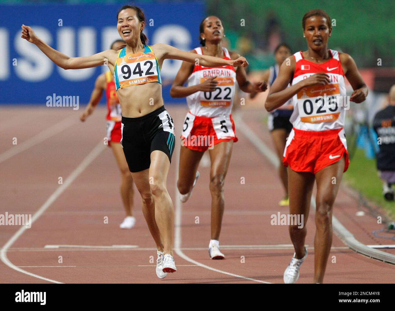 Vietnam's Thang Hang Truong, left, celebrates after clinching the ...