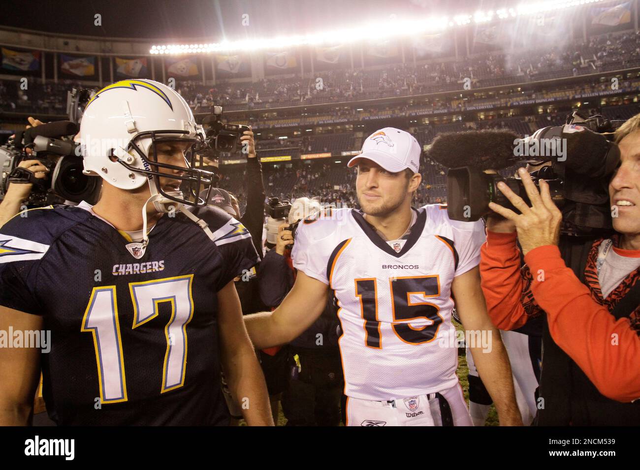 Denver Broncos quarterback Tim Tebow, San Diego Chargers quarterback ...