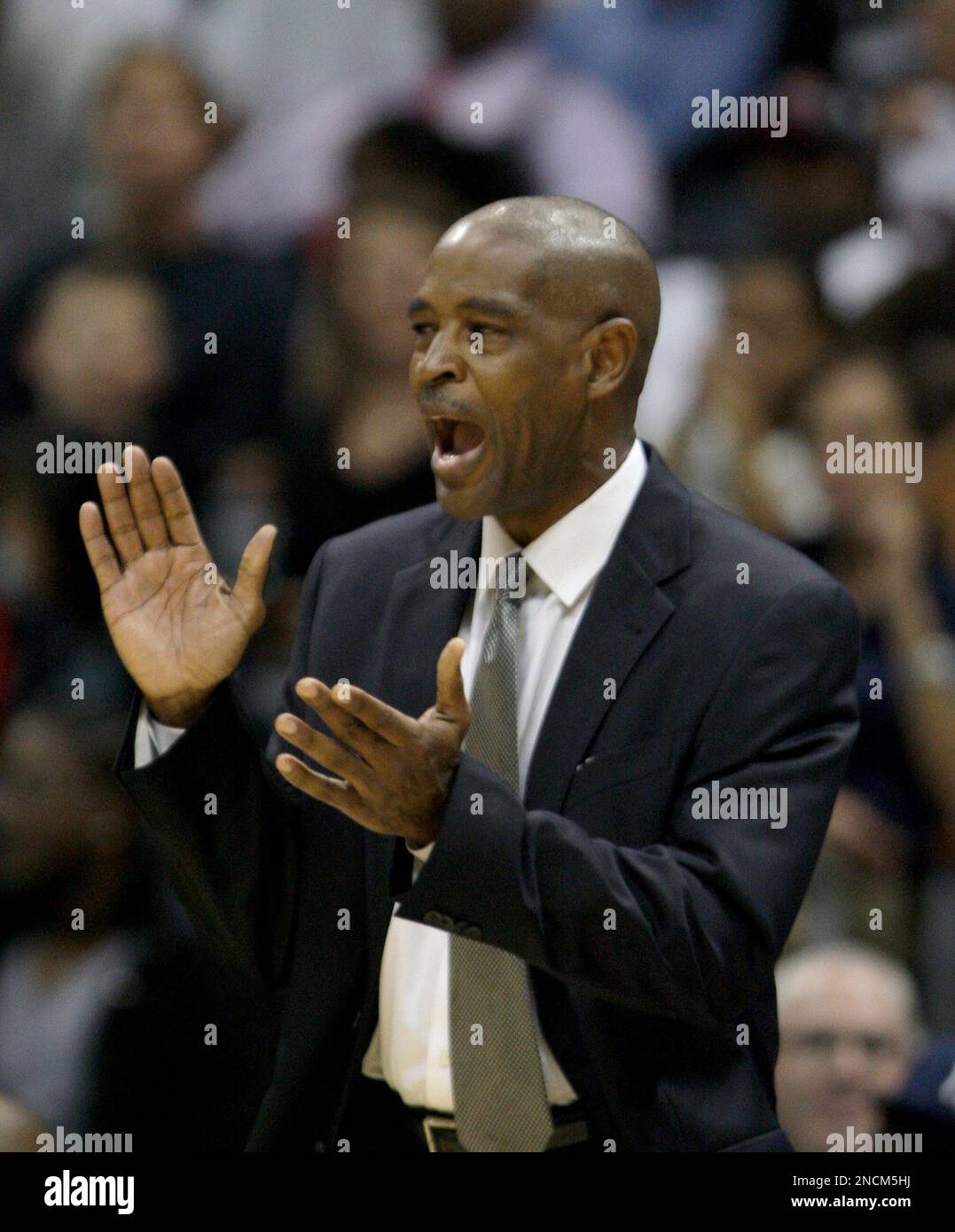 Atlanta Hawks head coach Larry Drew yells from the sidelines during an ...