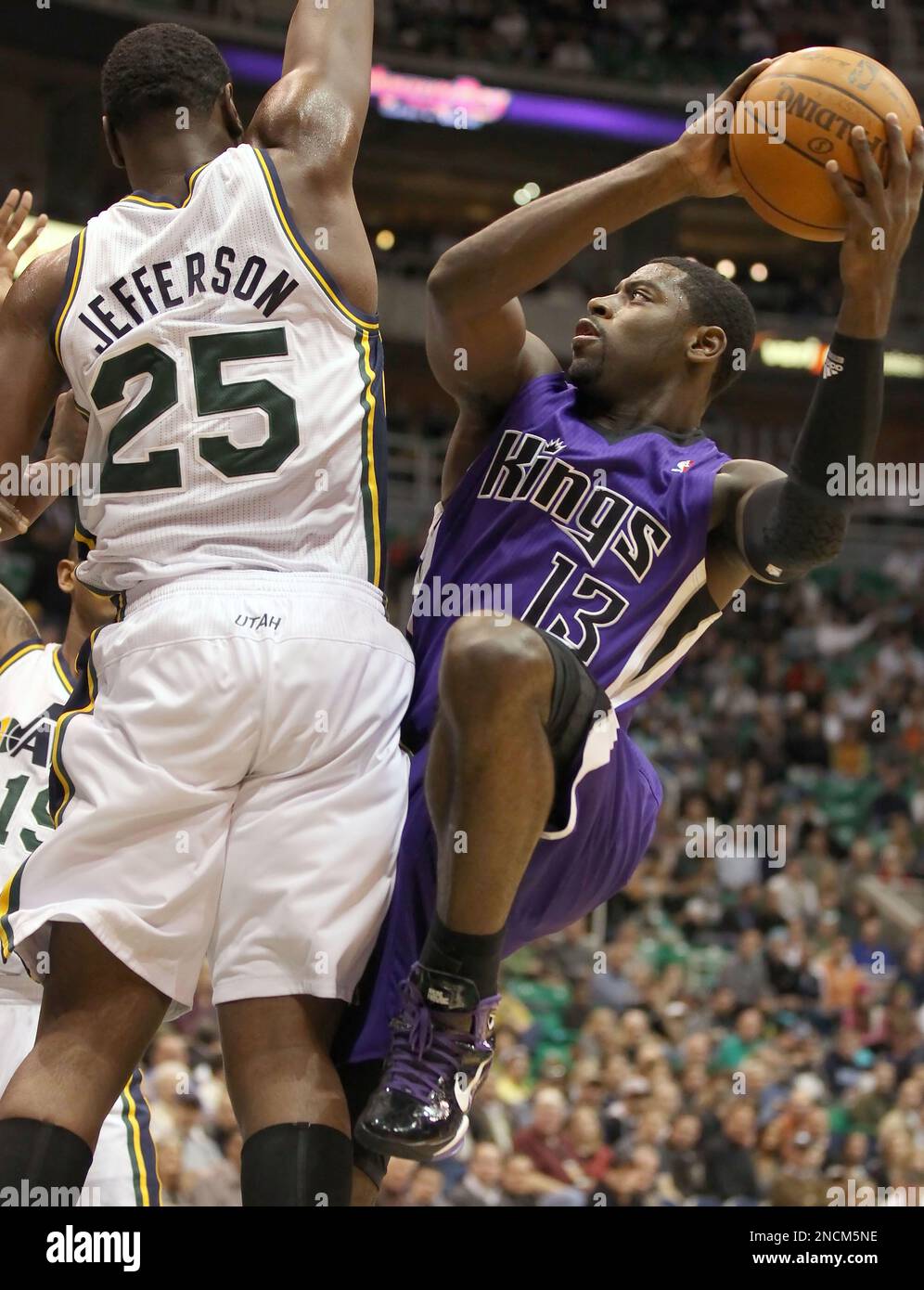 Sacramento King's Tyreke Evans, left, is fouled by Utah Jazz's Al ...